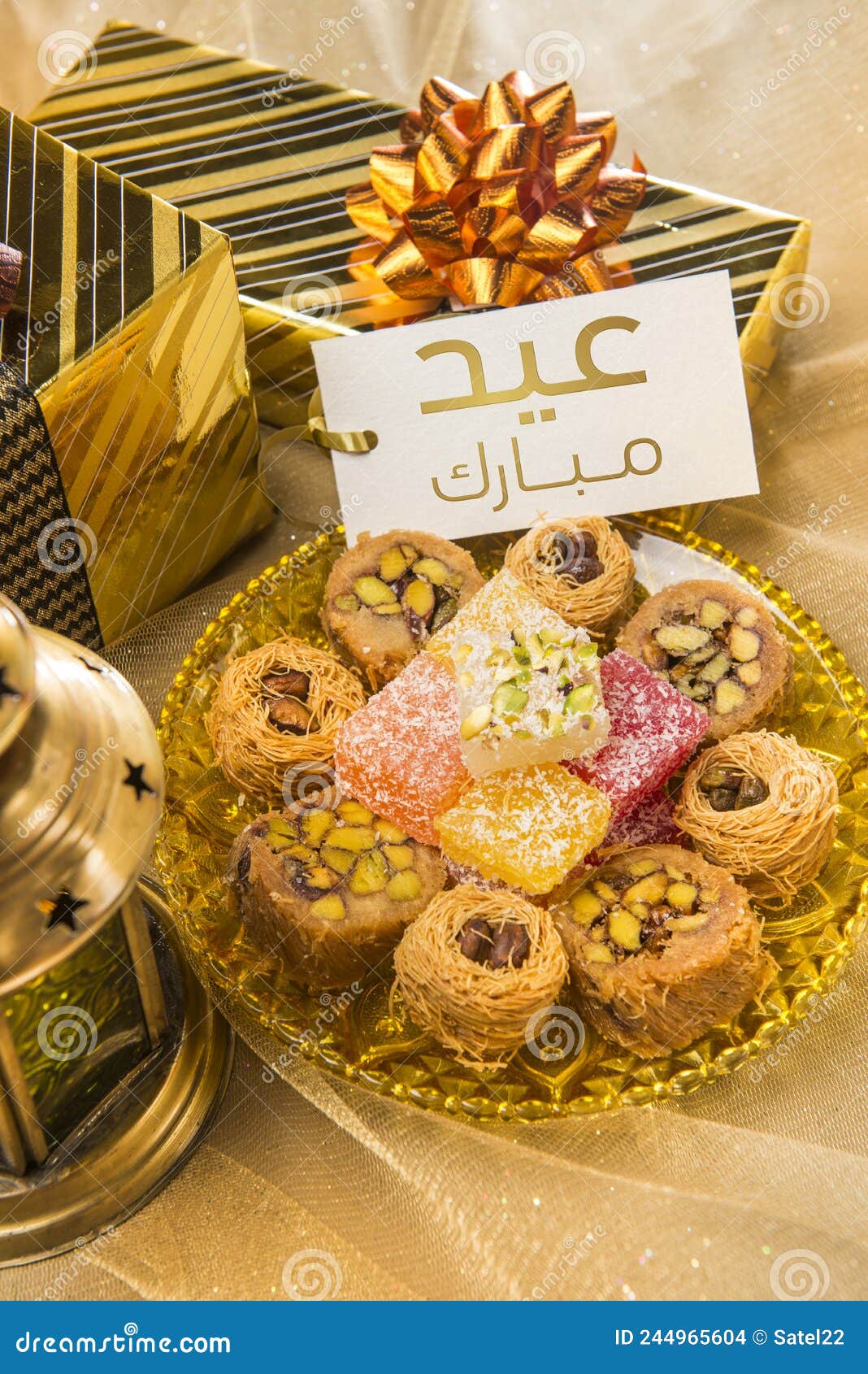 Eid Gifts and Sweets Along with Ramadan Lamp and Message Tag. Stock ...