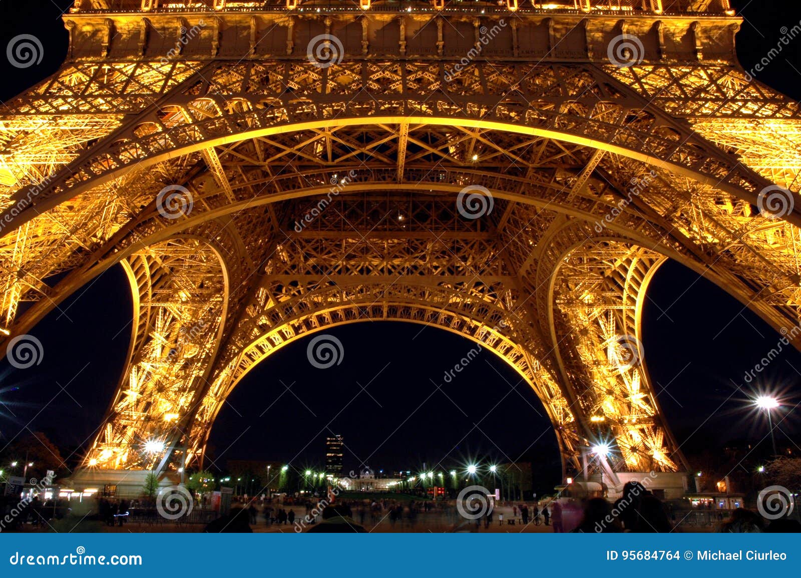 Eiffel tower Base at night editorial stock image. Image of night - 95684764