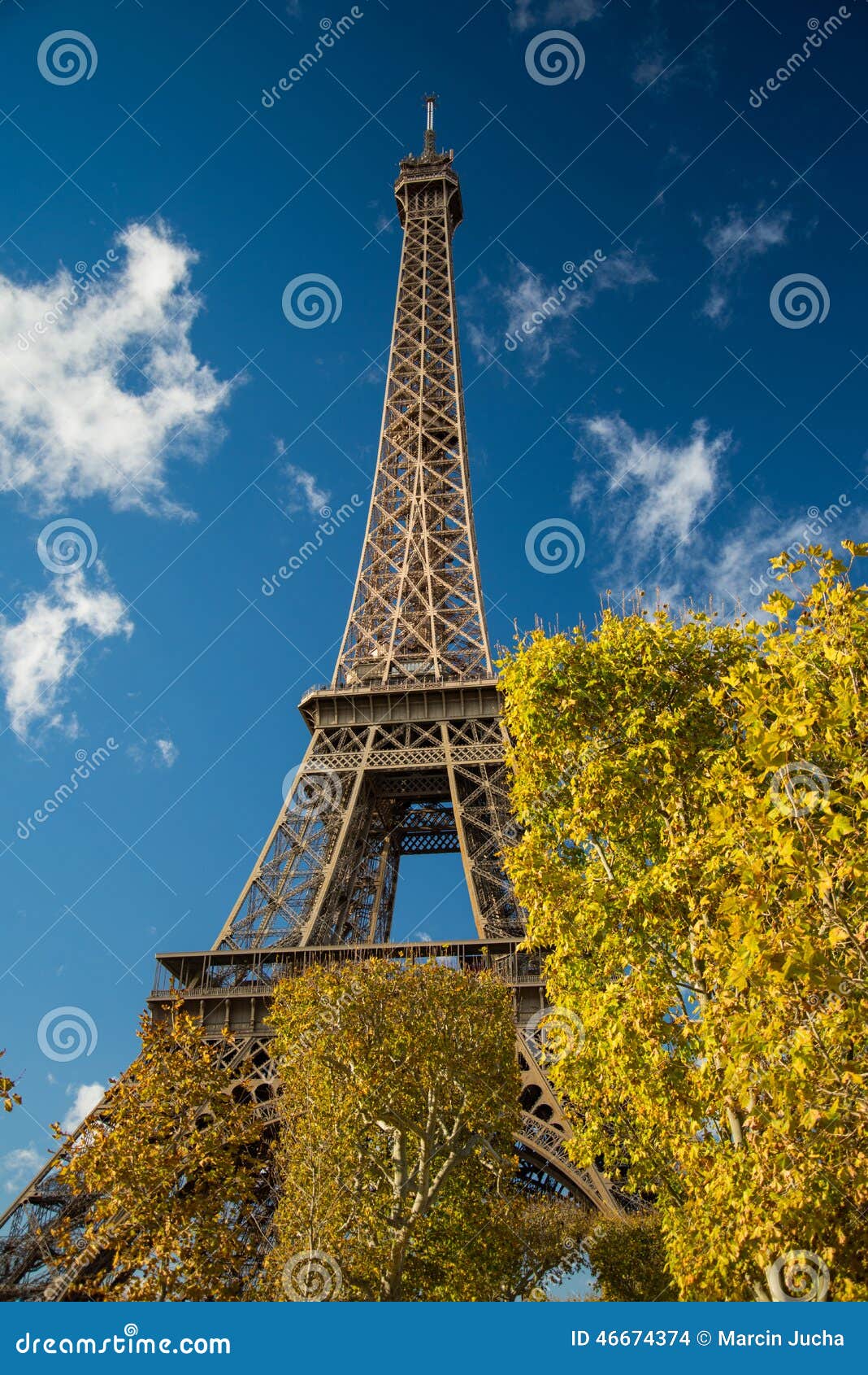 Eiffel Tower Over Blue Sky and Fall Leaves Stock Photo - Image of blue ...