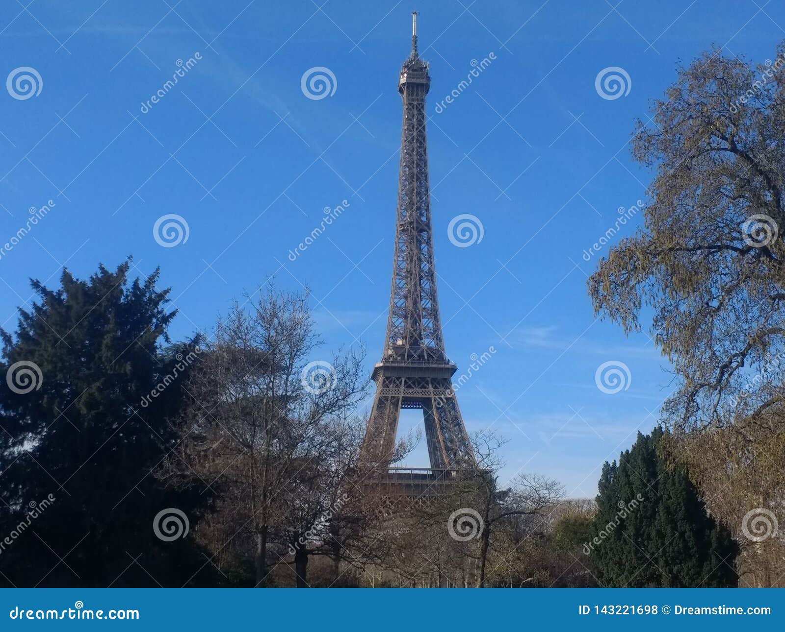 Eiffel Tower Over the Trees in Paris Stock Photo - Image of paris ... Eiffel Tower Over the Trees in Paris Stock Photo - Image of paris ...