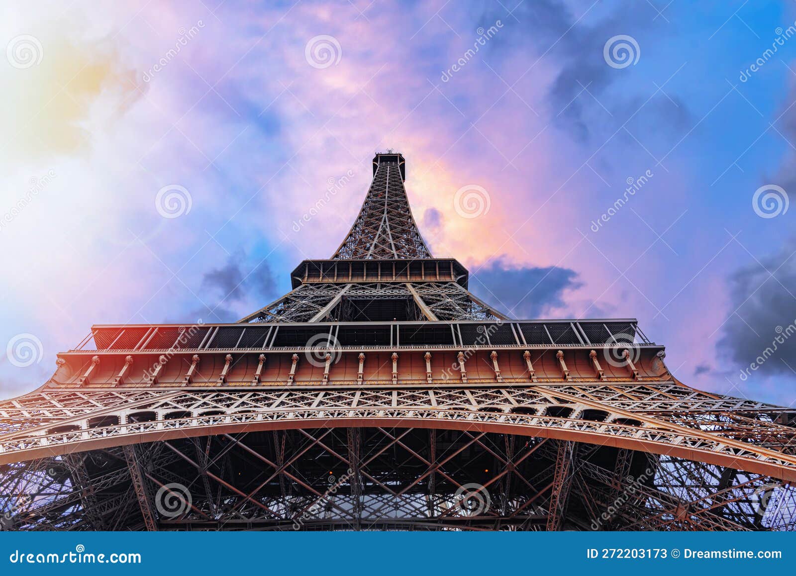 The Eiffel Tower in Paris Against the Backdrop of a Beautiful Sky ...