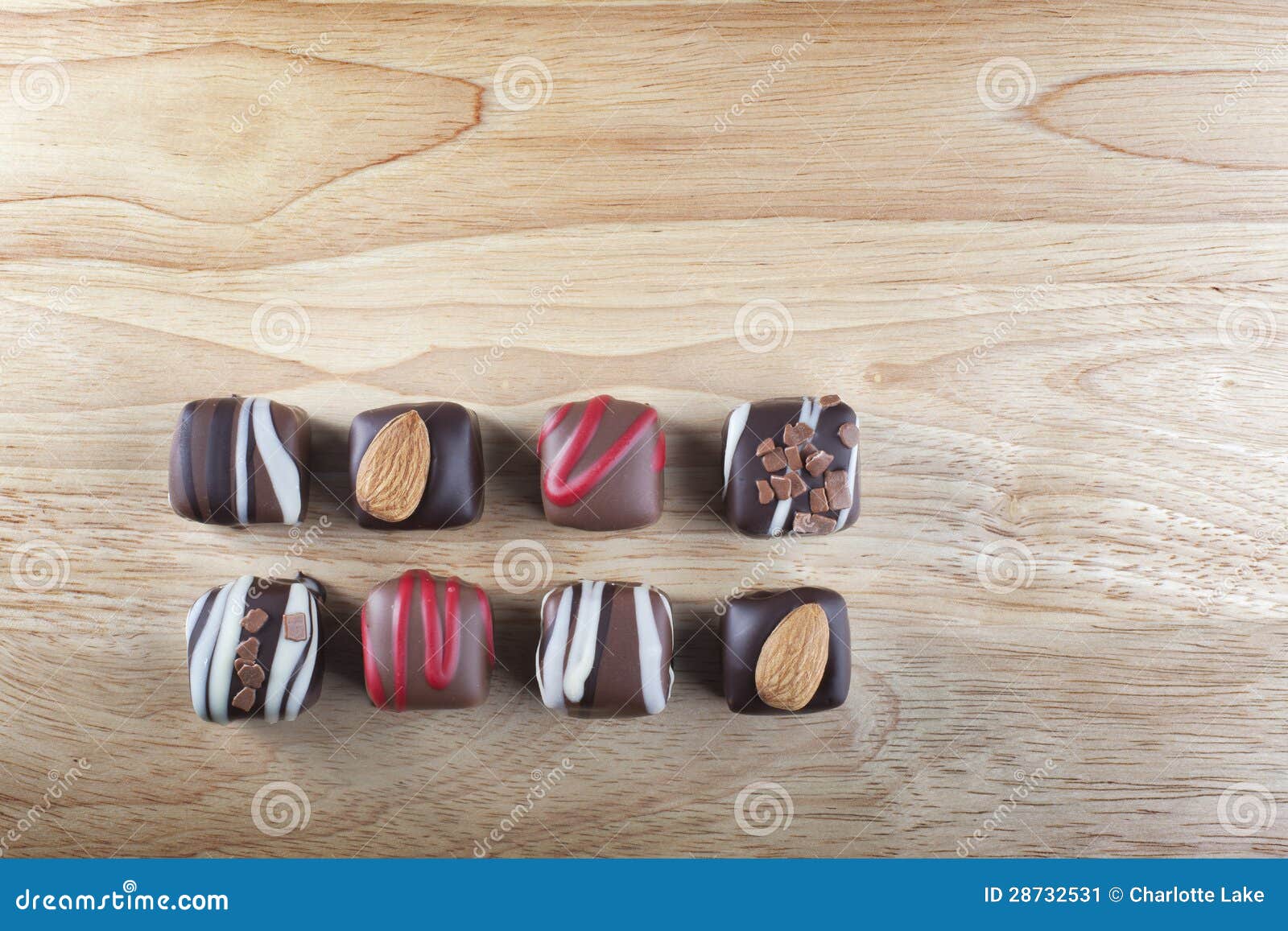 Eight Gourmet Chocolates stock image. Image of candy - 28732531