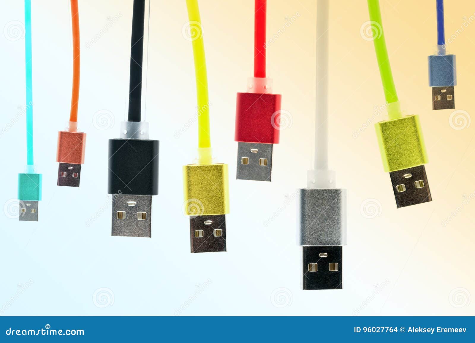 Eight Multicolored Usb Cables Hang Vertically, on a Gradient, Tinted ...