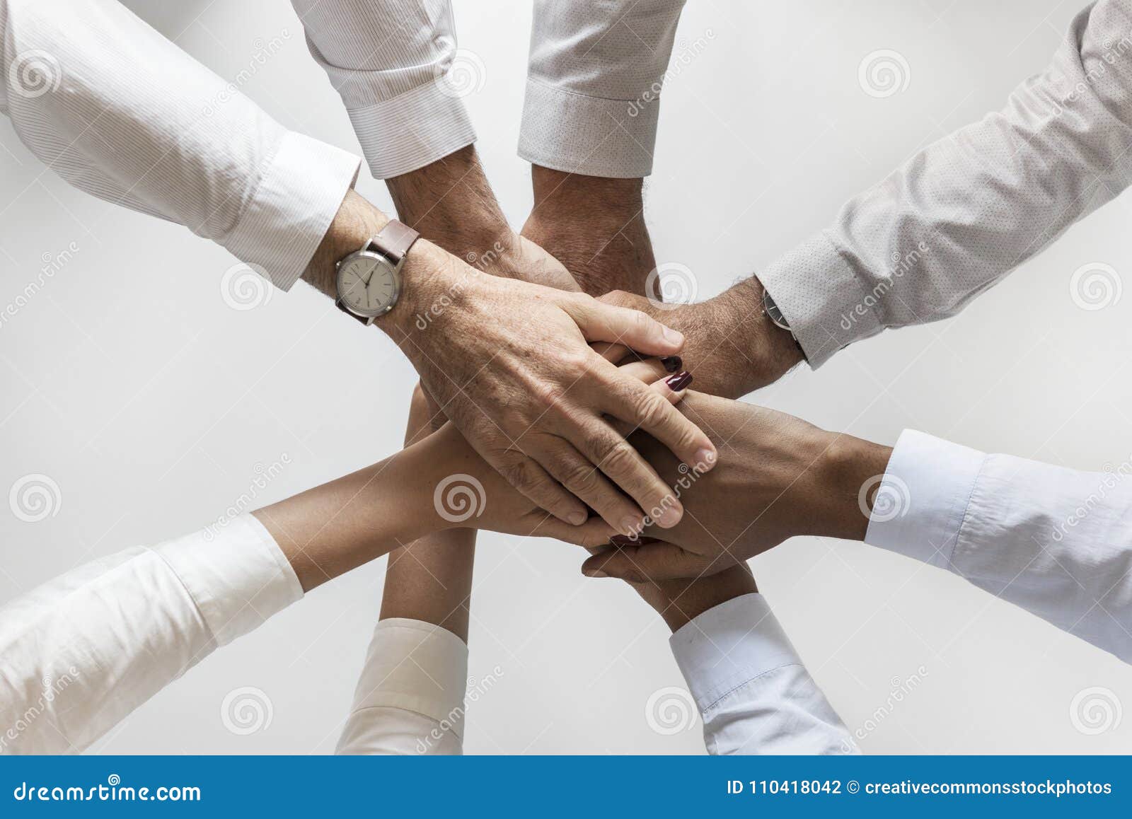 Eight Person Huddling Picture. Image: 110418042