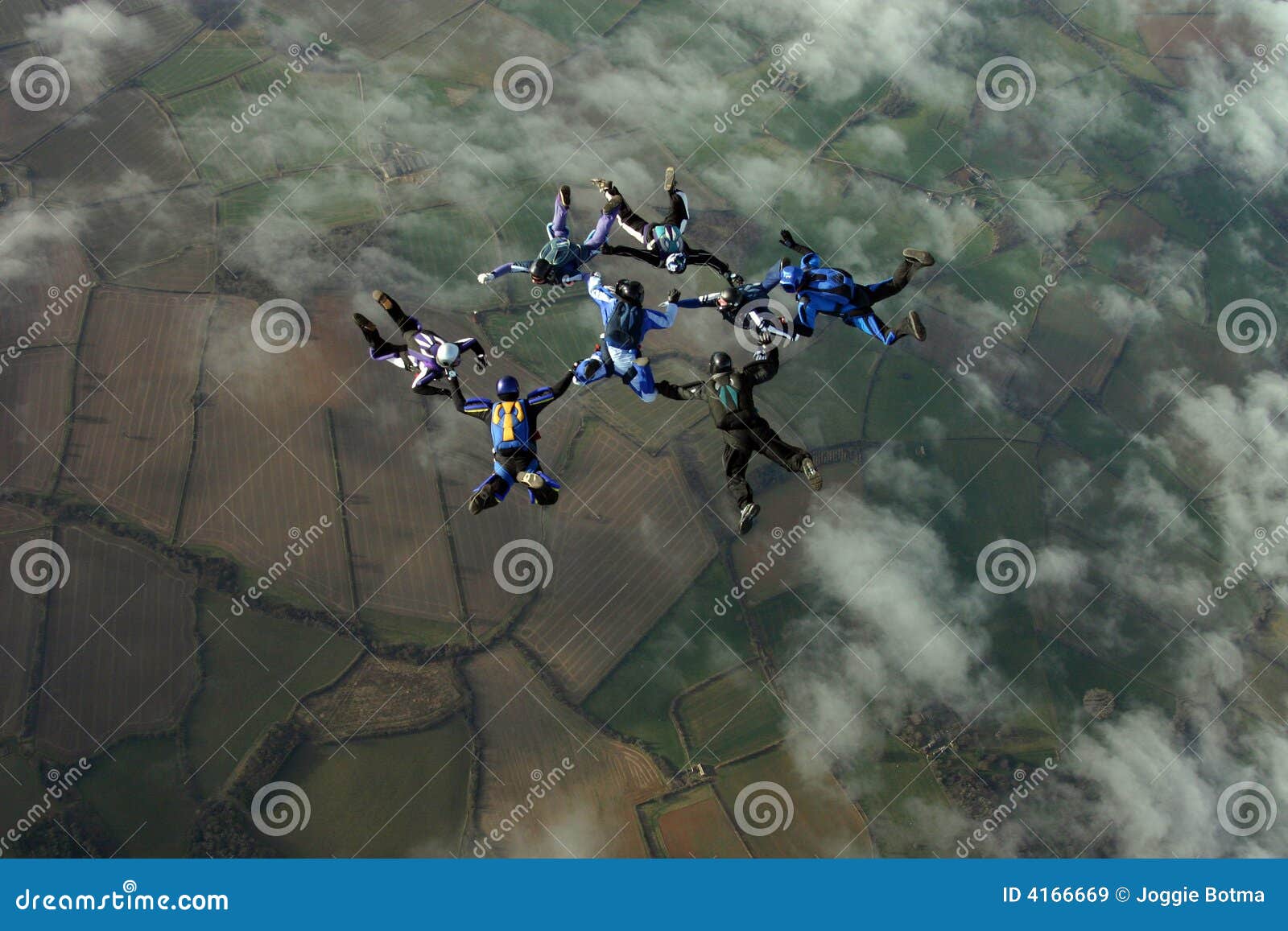 Eight Skydivers Building a Formation Stock Image - Image of flying ...