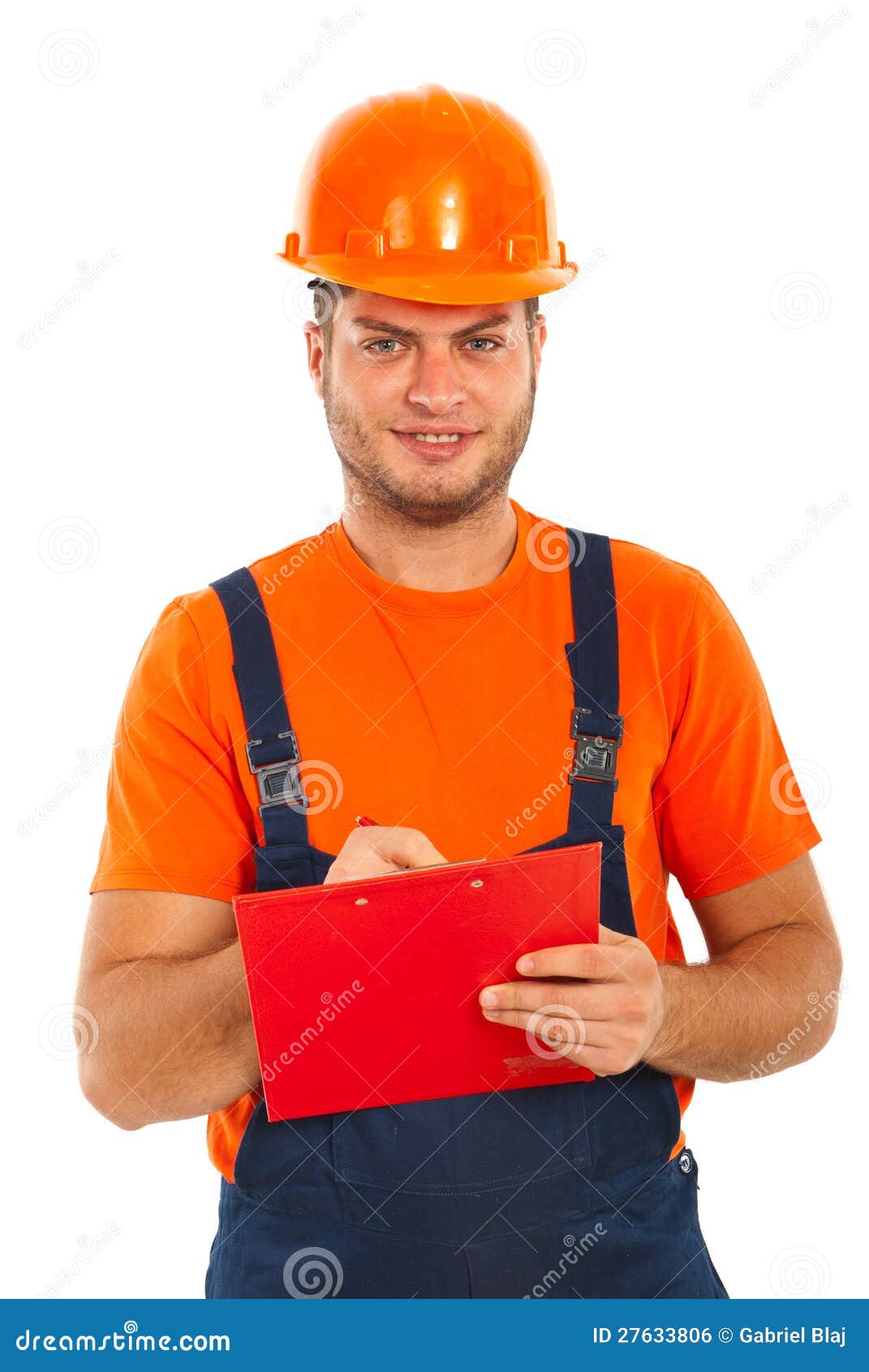 El Hombre Del Constructor Escribe a Un Sujetapapeles Foto de archivo ...