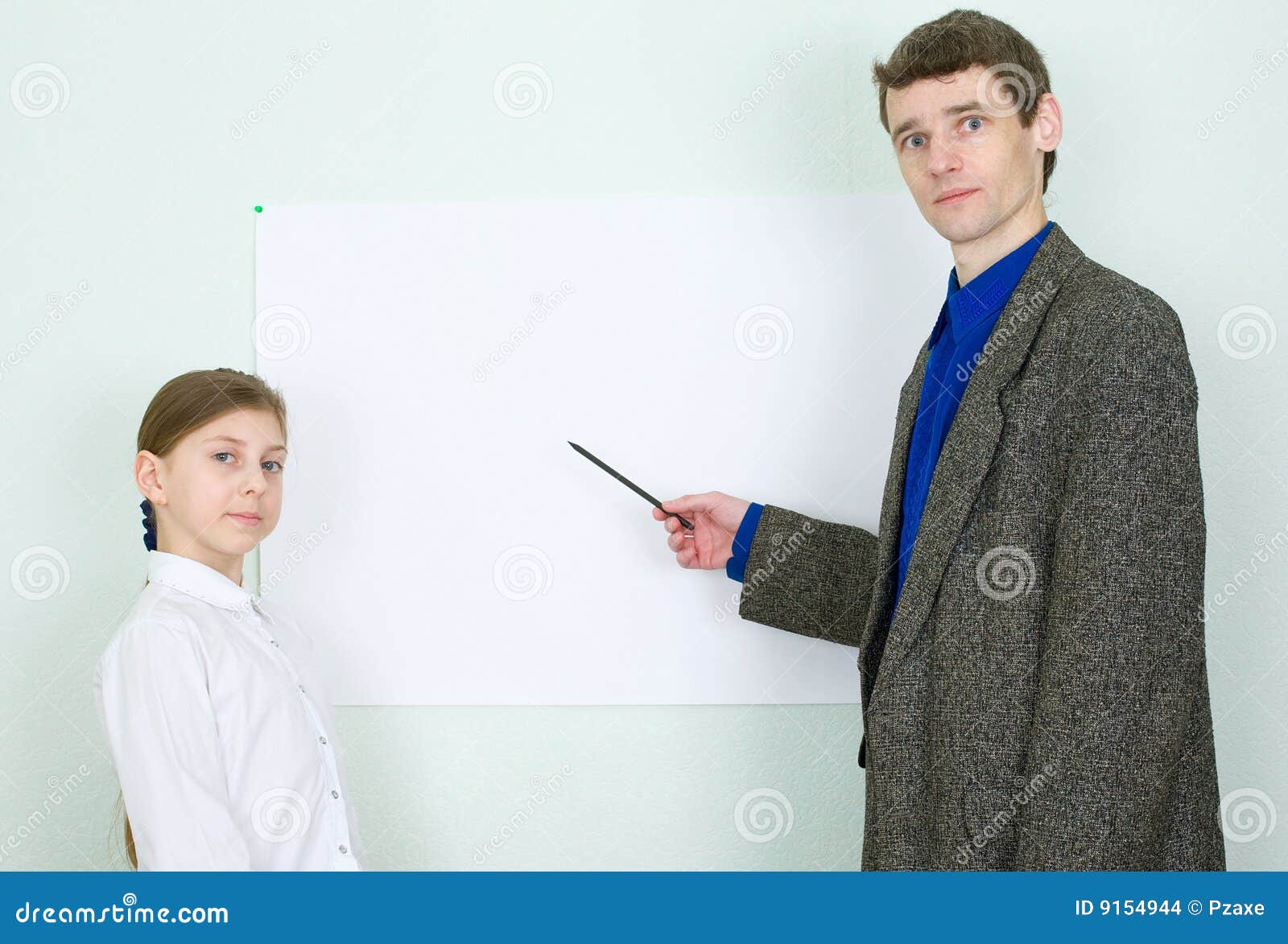 El Profesor Explica Algo a La Colegiala Foto de archivo - Imagen de ...