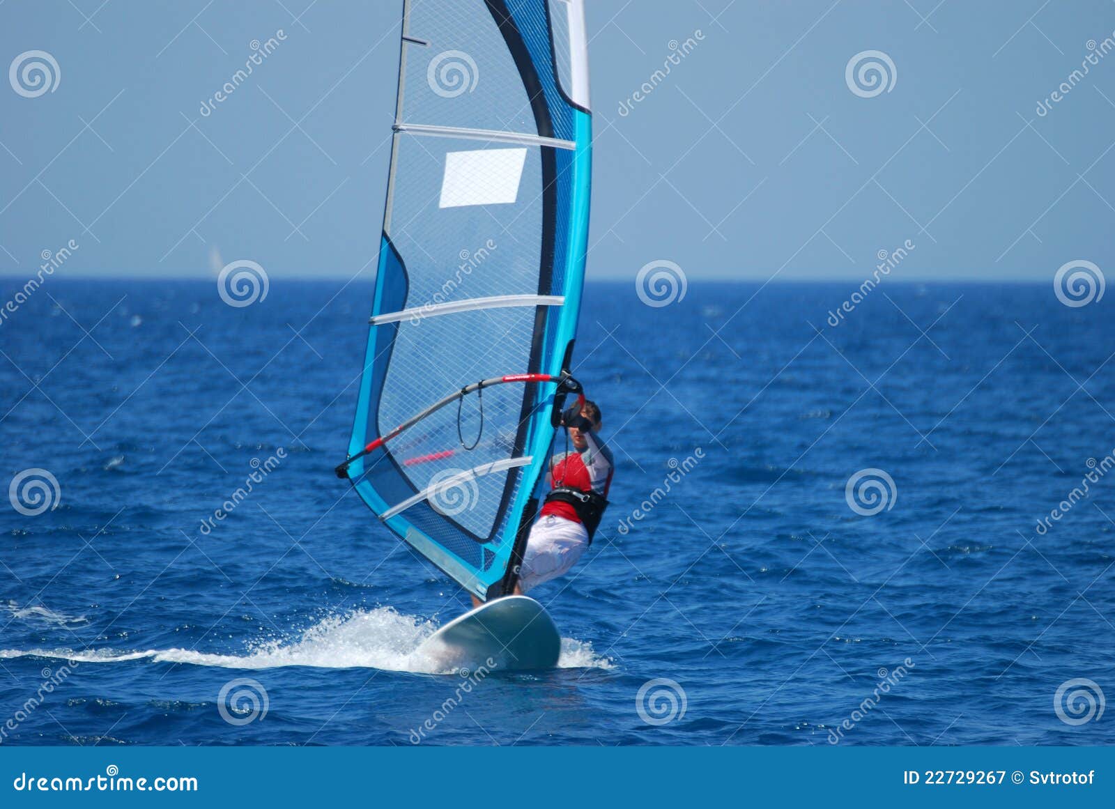 El Windsurfing En El Movimiento Imagen de archivo - Imagen de hombre ...