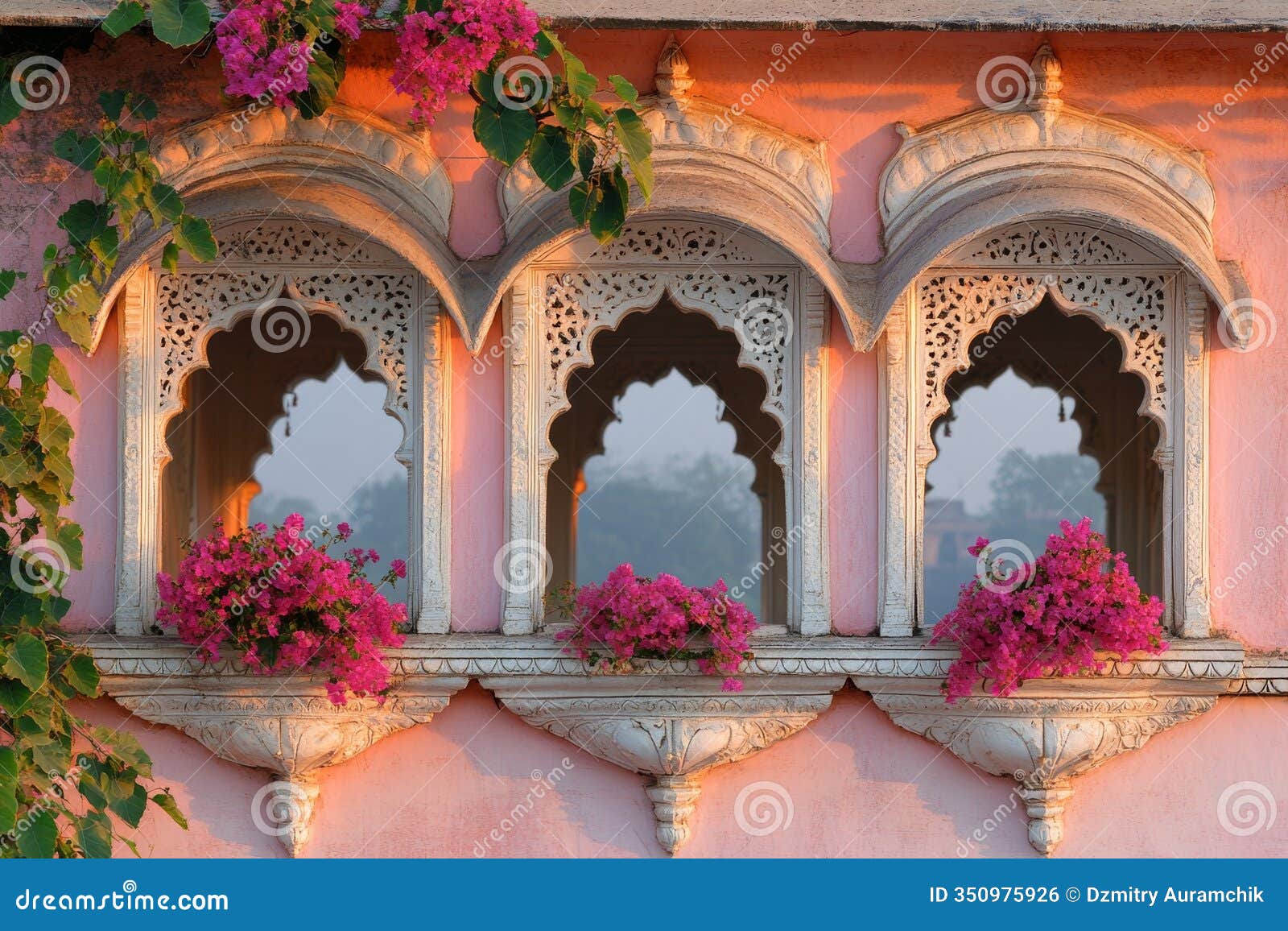 Elaborate Windows, Lively Bougainvillea, and a Facade Illuminated by ...