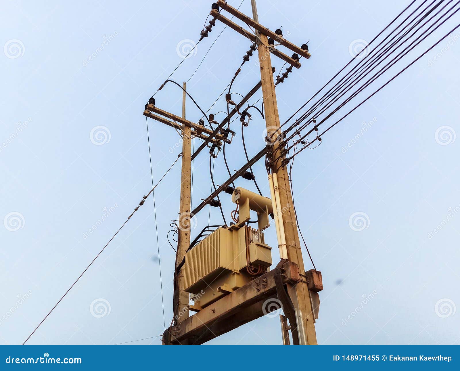 The Elactric Tower and Transformers on Blue Sky Background. Stock Image ...