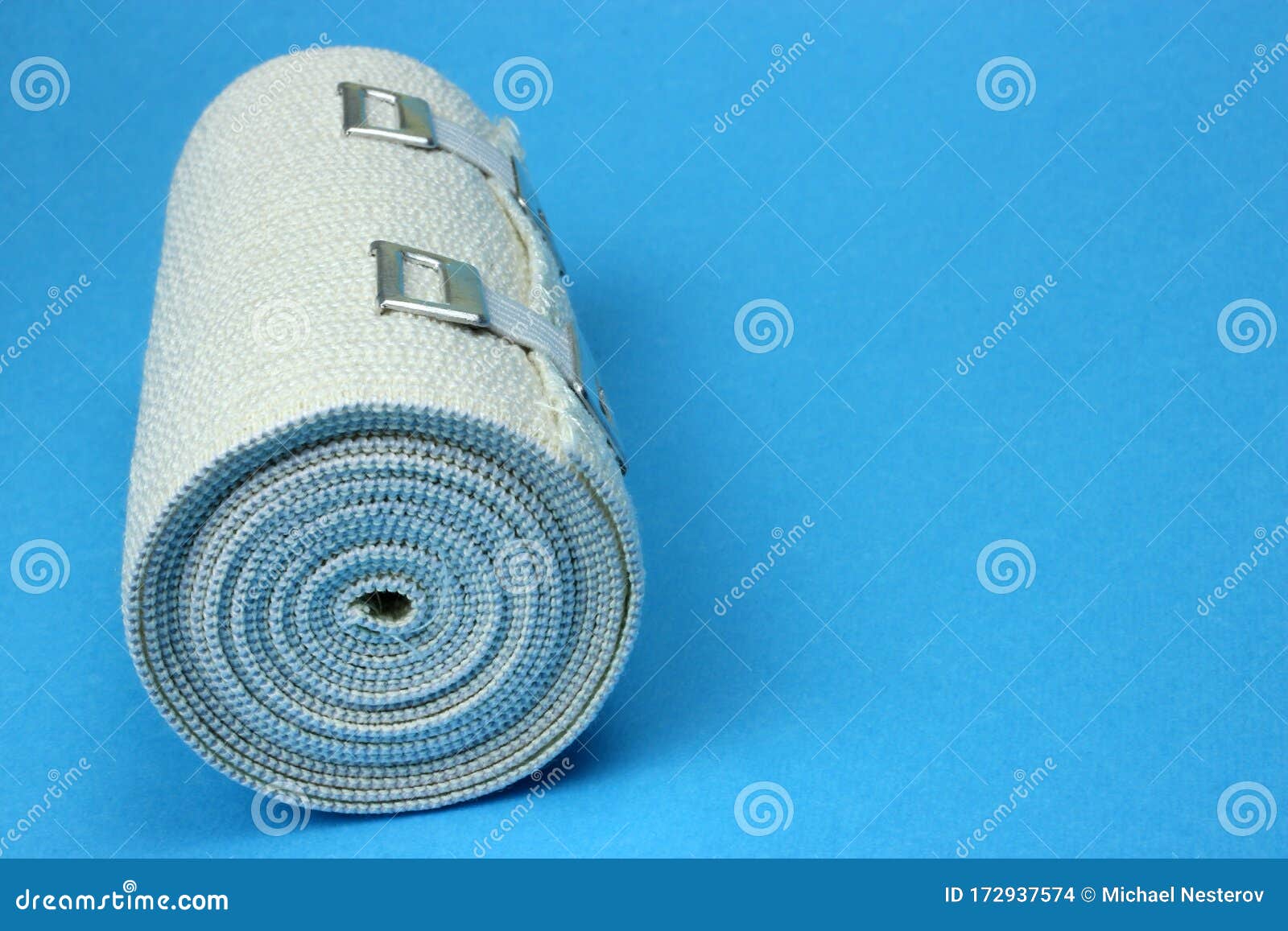 Elastic Bandage on a Blue Background Stock Photo - Image of medical ...