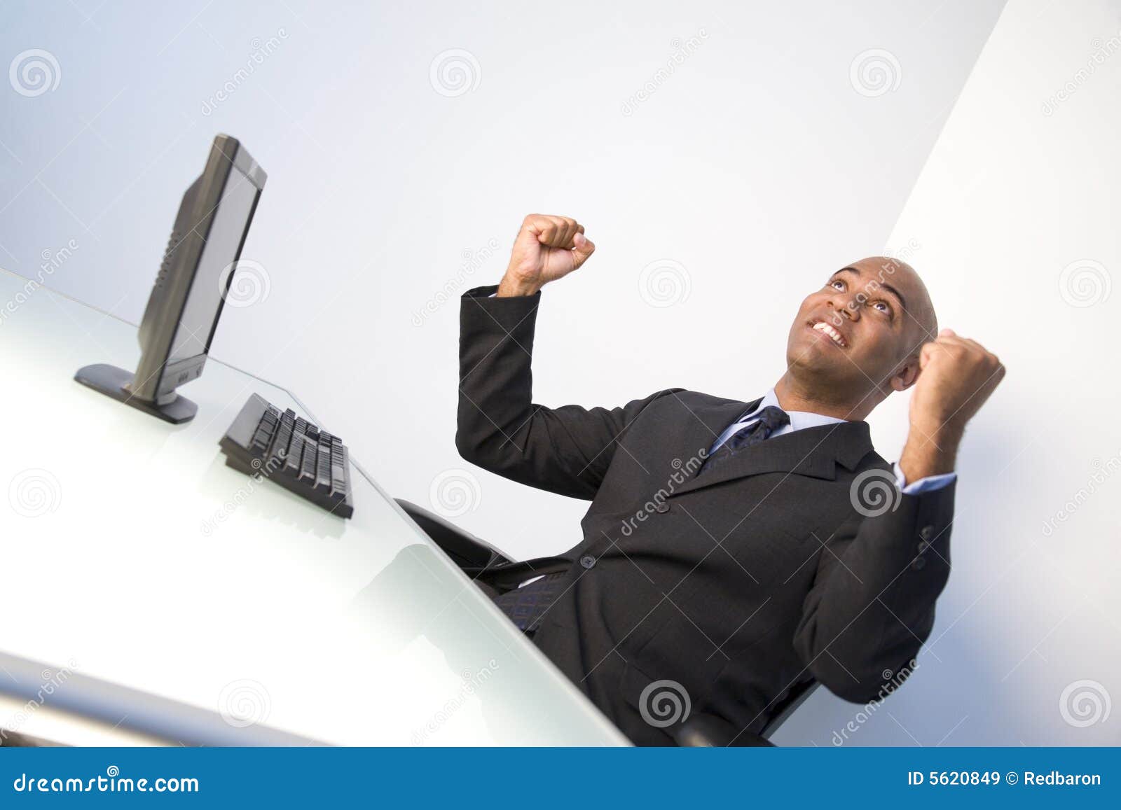 Elated businessman stock image. Image of happiness, holding - 5620849