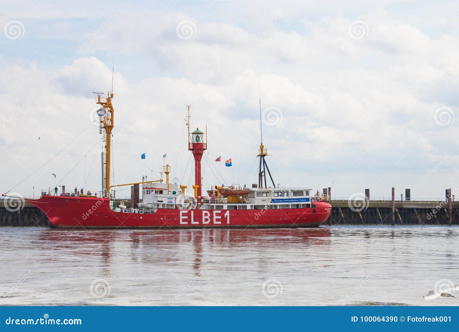 Fire Ship And Gantry Crane On A Background Of Mountains Stock ...