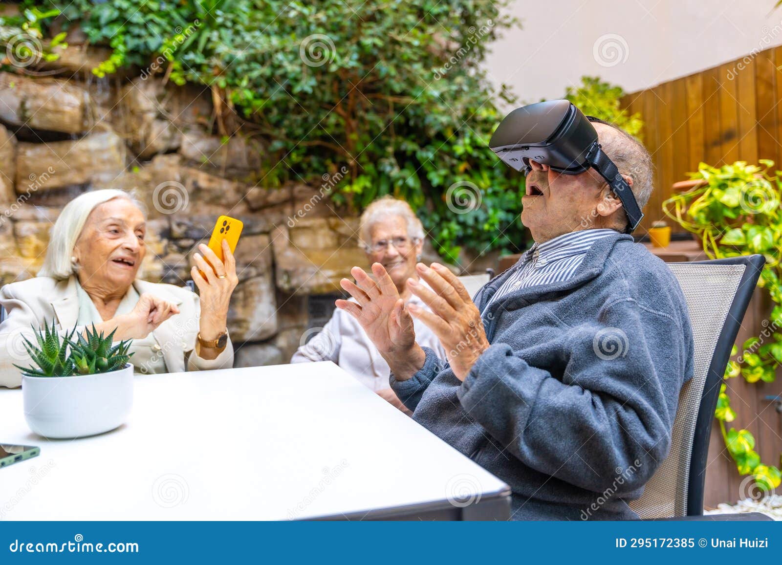 Elder Man Using Virtual Reality Goggles in a Nursing Home Stock Image ...