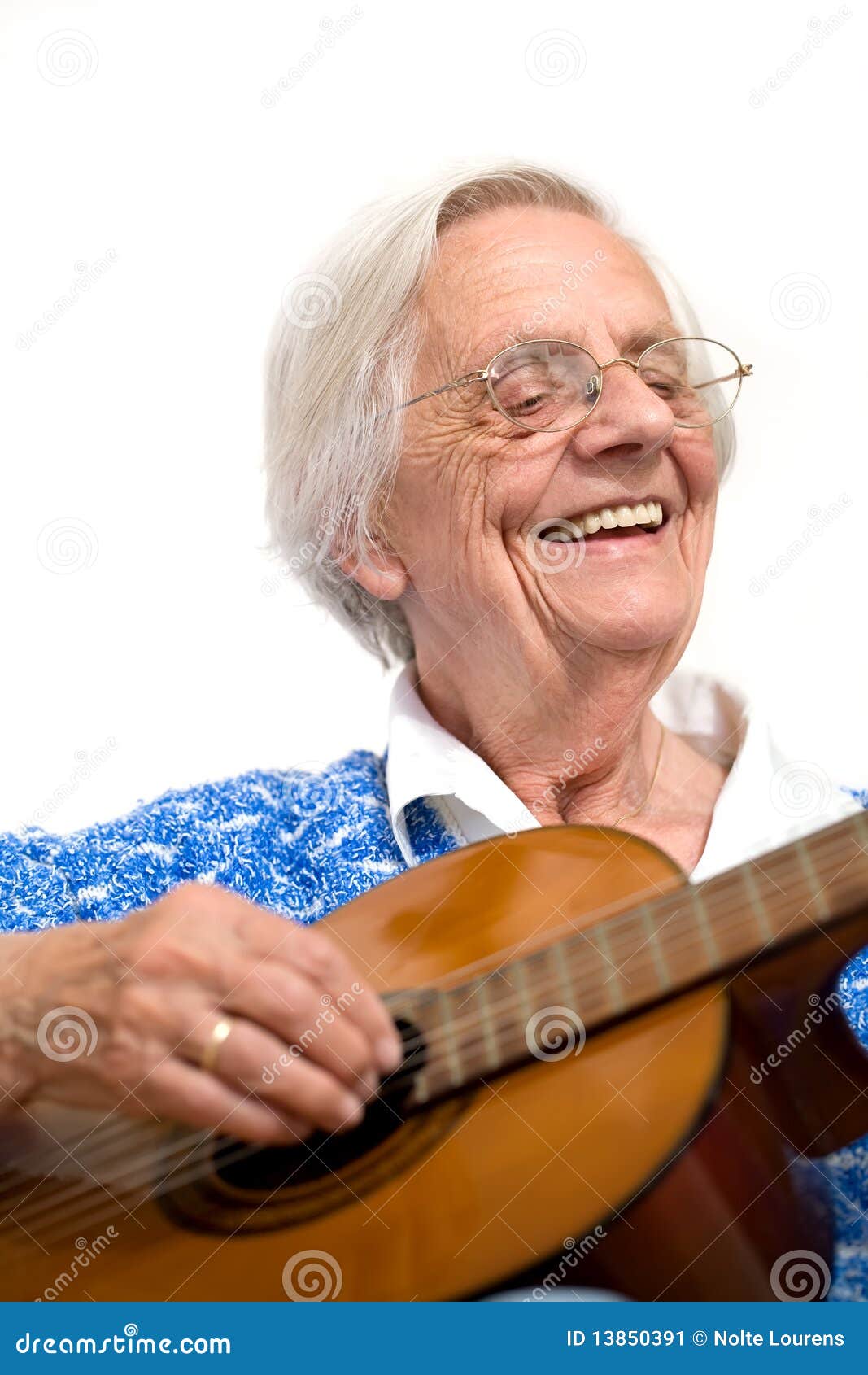 Elder Woman Playing Guitar. Stock Image - Image of hand, cheerful: 13850391