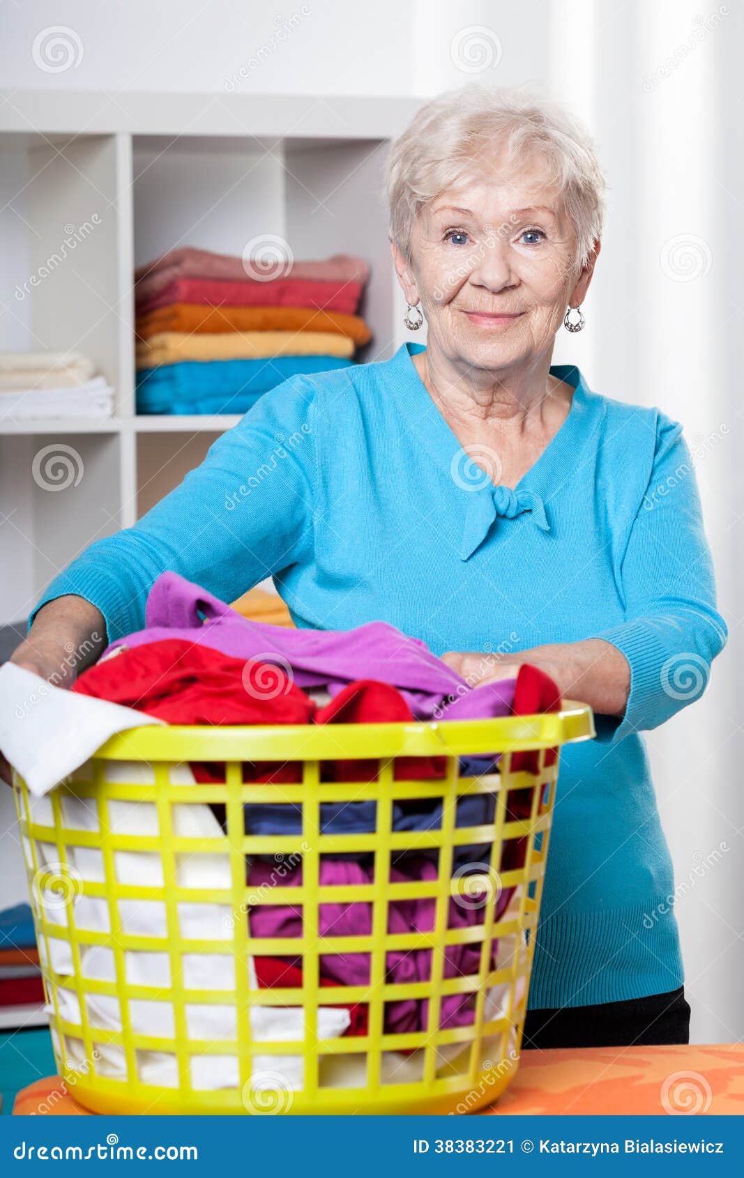 Elderdly lady with washing stock image. Image of clothes - 38383221