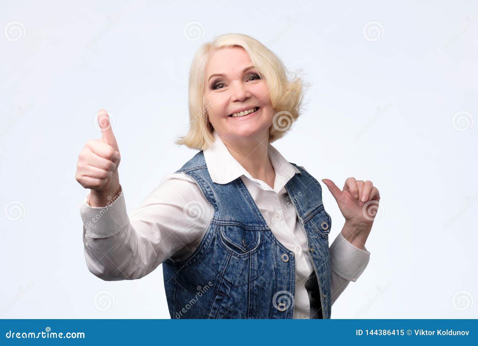Elderly Blonde European Woman Giving A Thumb Up Stock Image Image Of