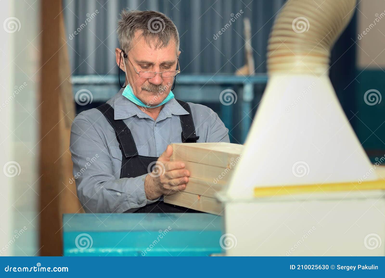 An Elderly Carpenter of Caucasian Appearance Works in a Carpentry ...
