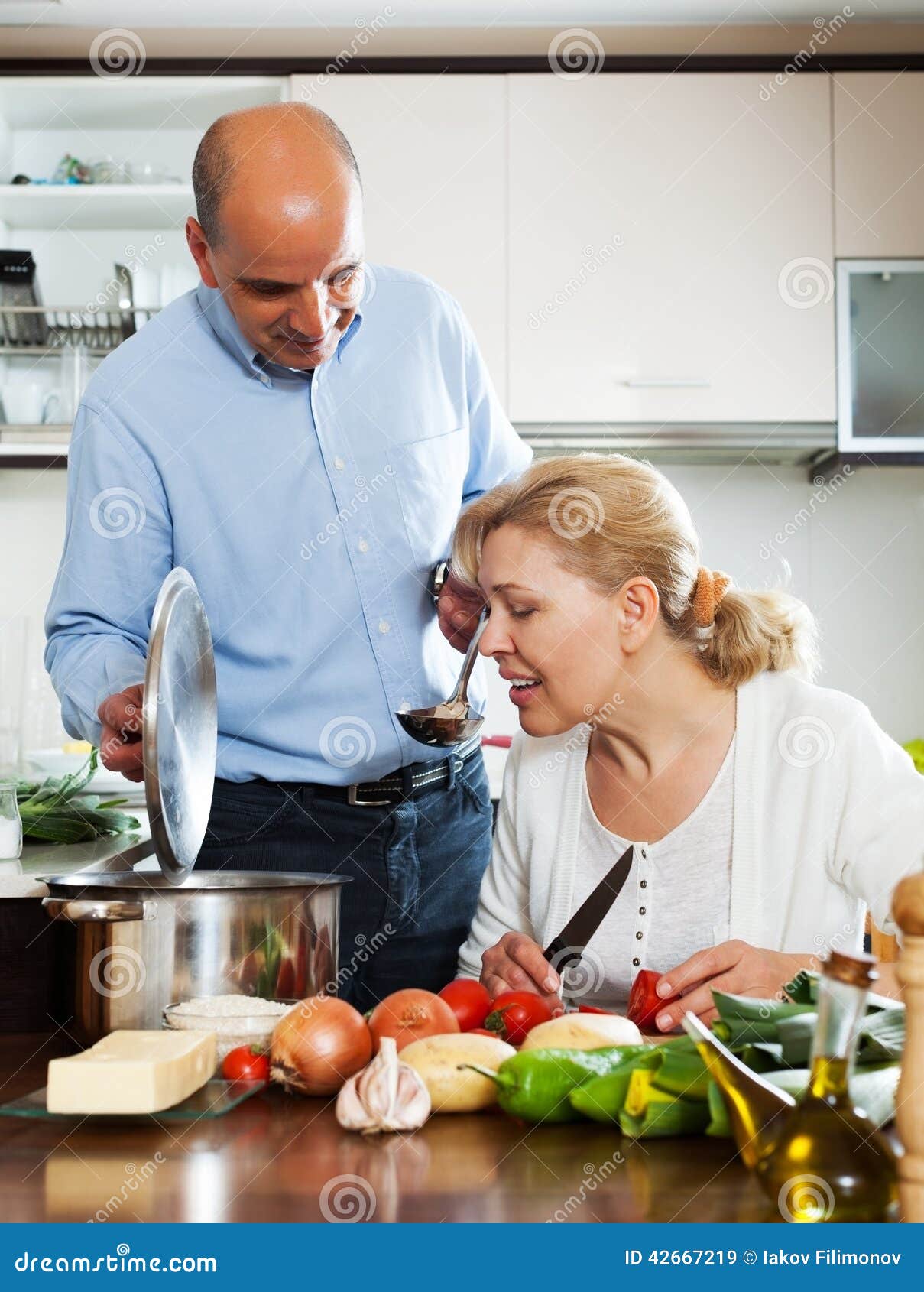 Elderly Couple Cooking Together Stock Image - Image of pensioner ...