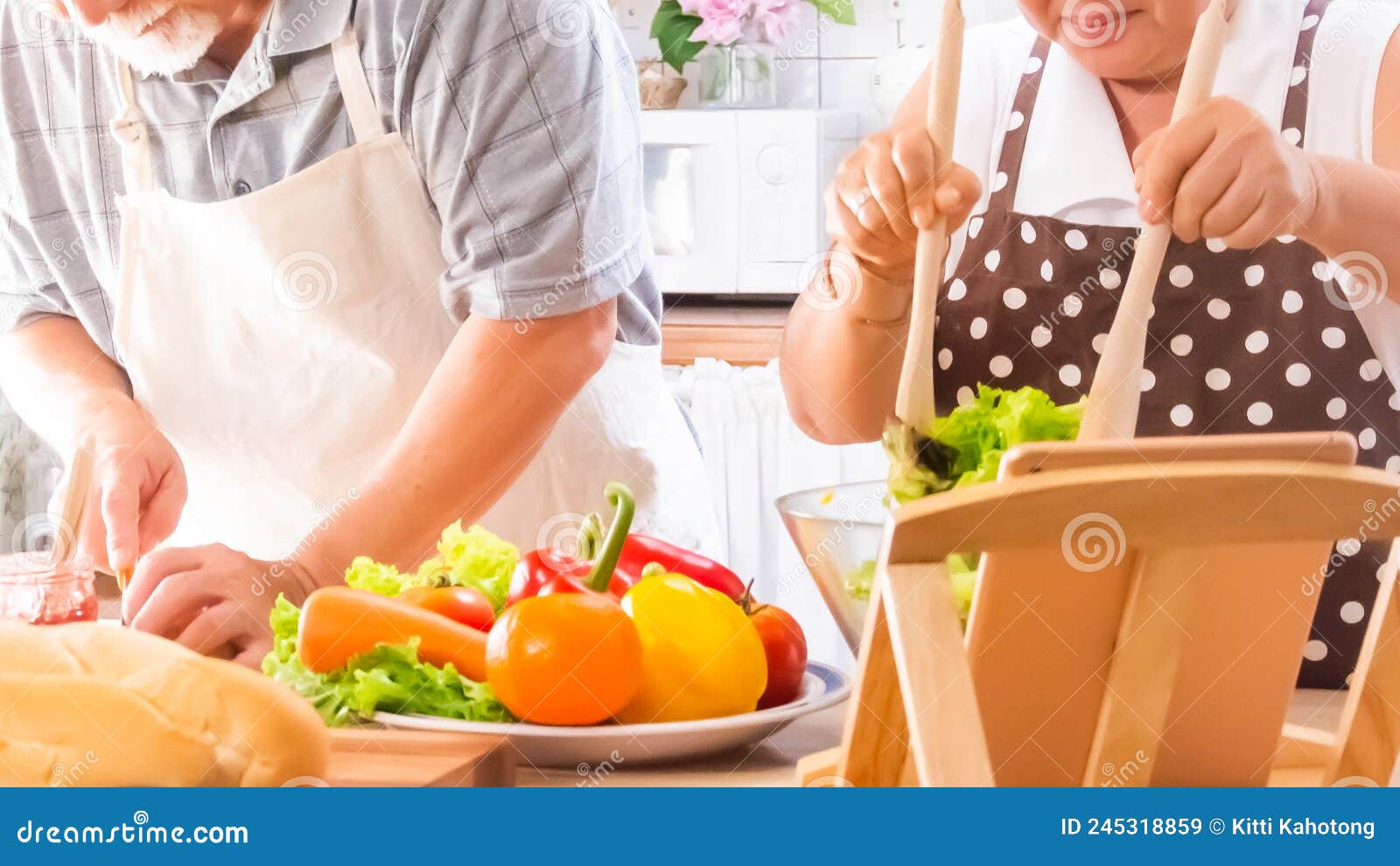 An Elderly Couple are Helping To Cook in the Kitchen Stock Image ...