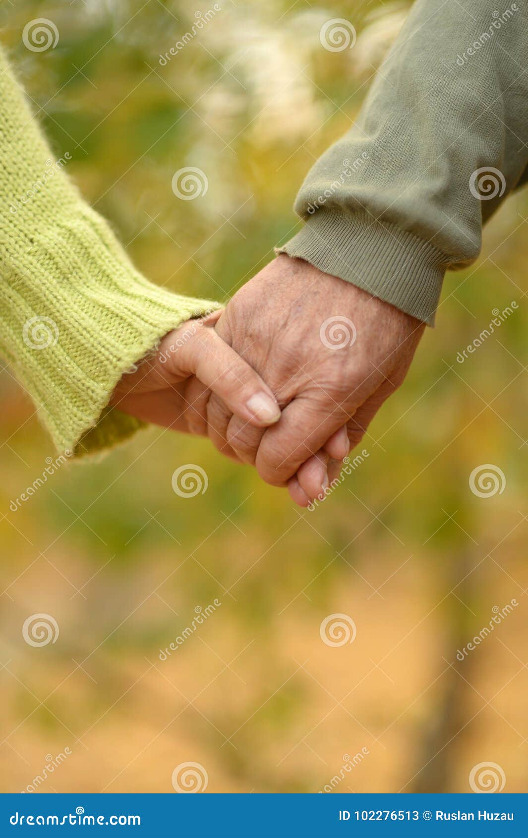 Elderly Couple Holding Hands Stock Image - Image of friendly, care ...