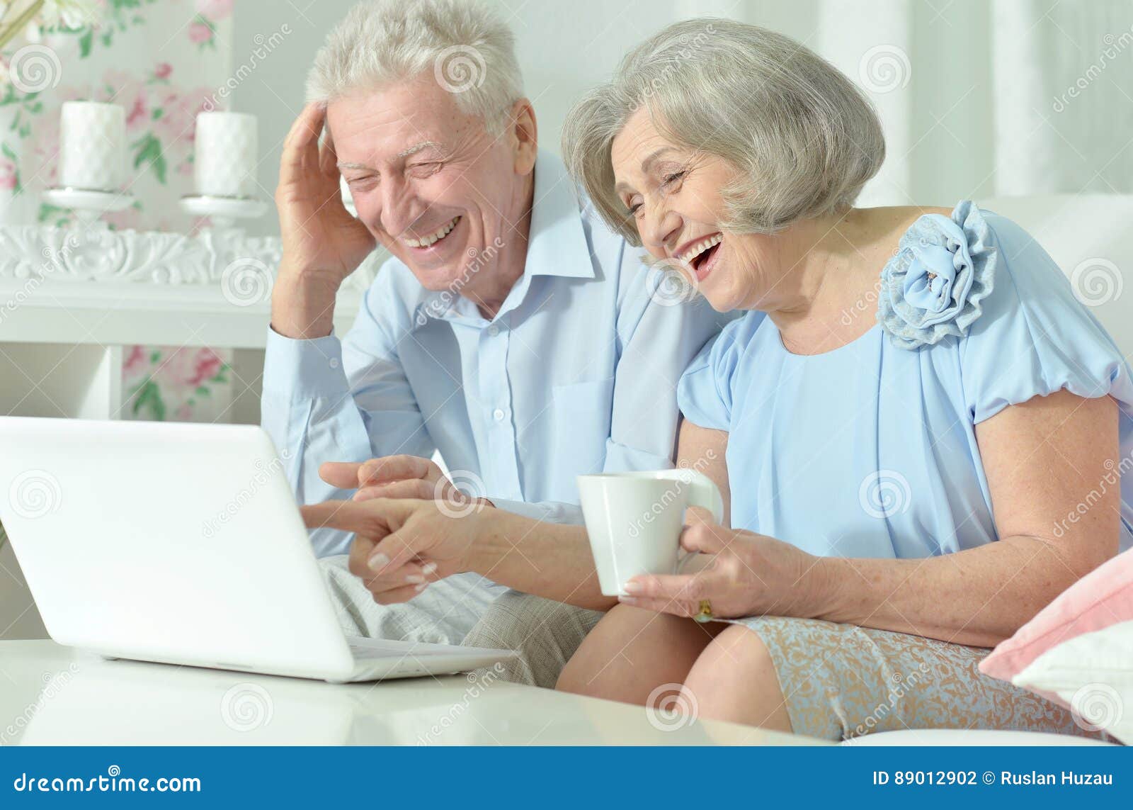 Elderly Couple with a Laptop Stock Photo - Image of online, computer ...