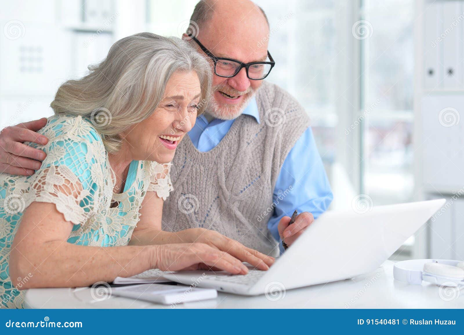 Elderly Couple with a Laptop Stock Image - Image of elder, laptop: 91540481