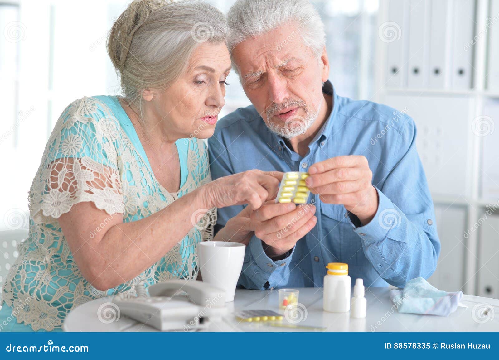 Elderly couple with pills stock image. Image of mature - 88578335