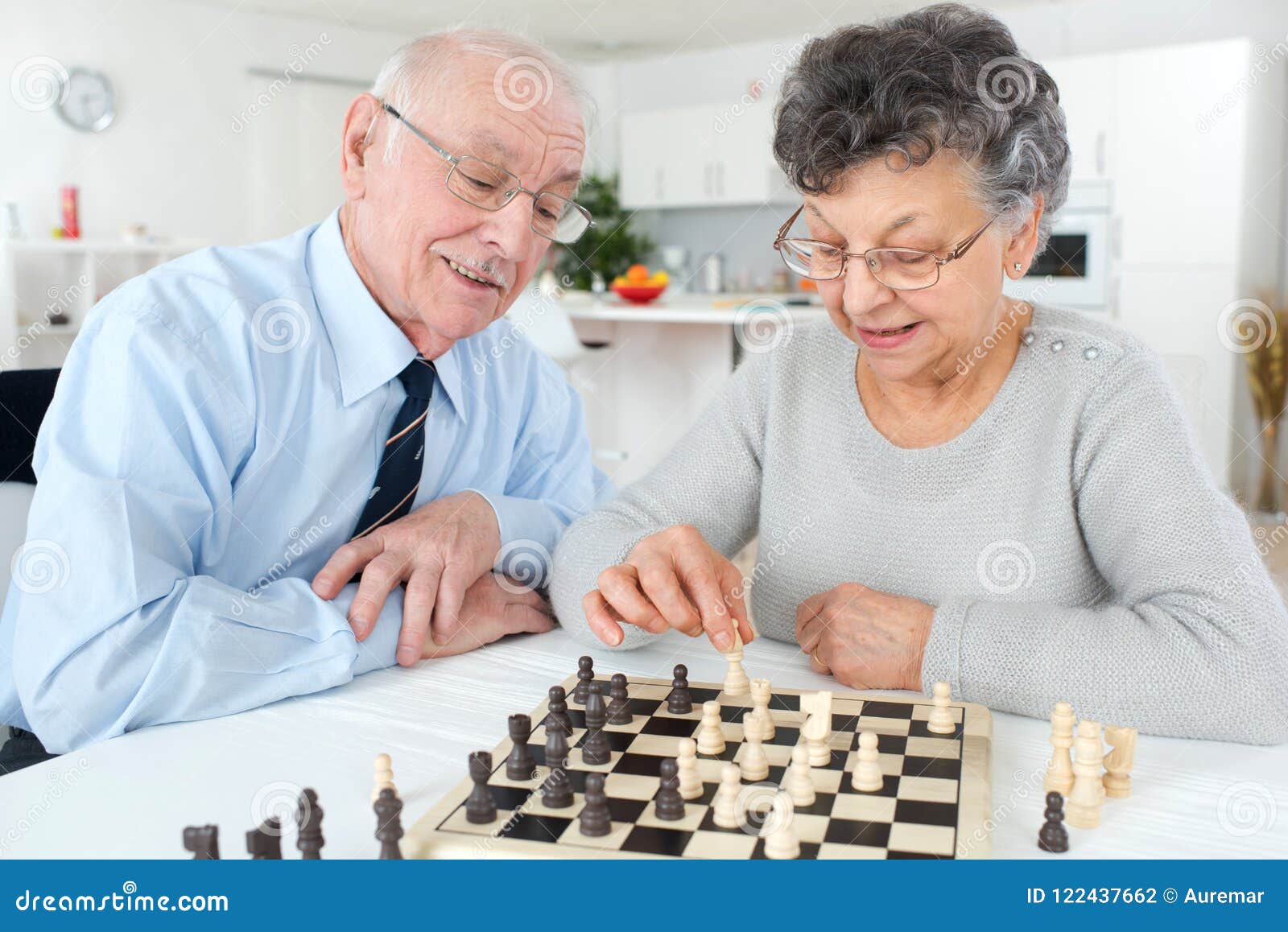 Elderly Couple Playing Chess Stock Photo - Image of mental, married ...