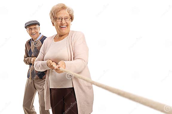 Elderly Couple Pulling a Rope Stock Image - Image of compete, pulling ...