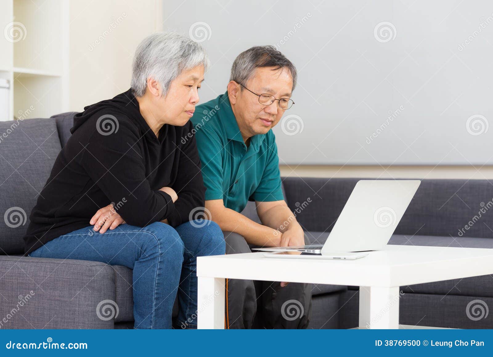 Elderly Couple Using Laptop Computer Stock Photo - Image of couple ...