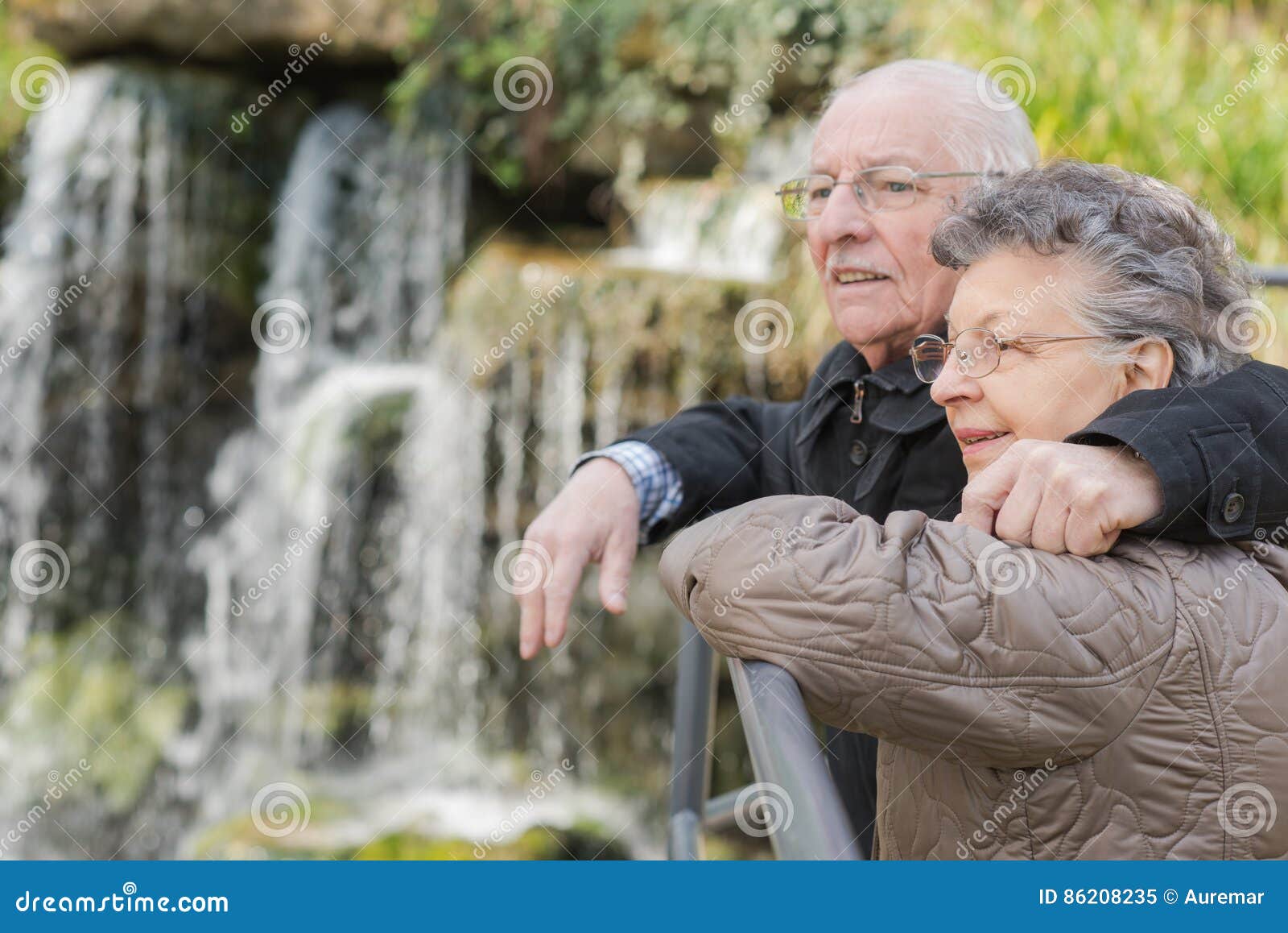 Elderly Couple and Waterfalls Stock Image - Image of retirement, senior ...