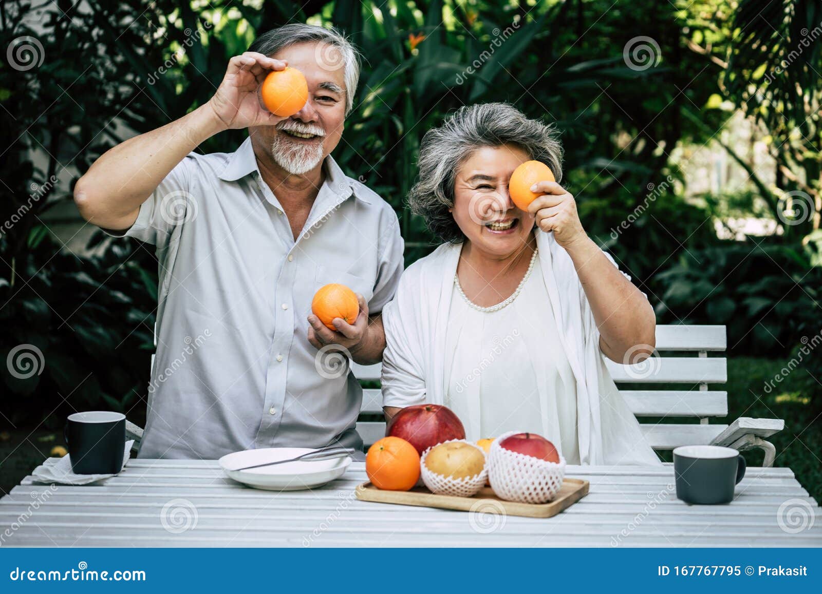 Elderly Couples Eating Some Fruit Stock Image - Image of relaxing, home ...