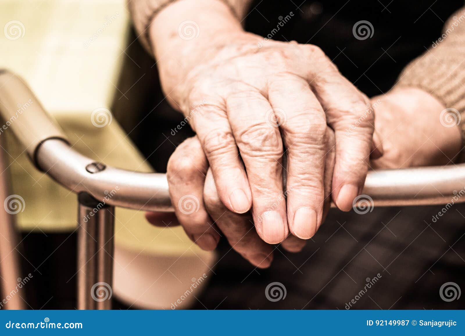 Elderly hands on a walker stock image. Image of adult - 92149987
