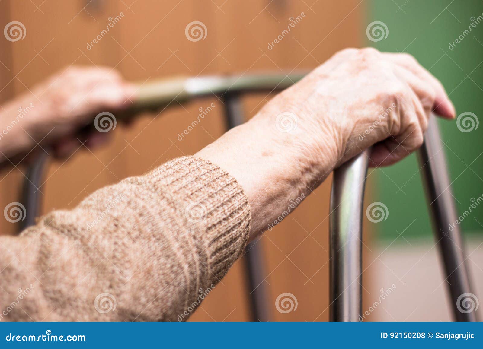 Elderly hands on a walker stock photo. Image of grandparent - 92150208