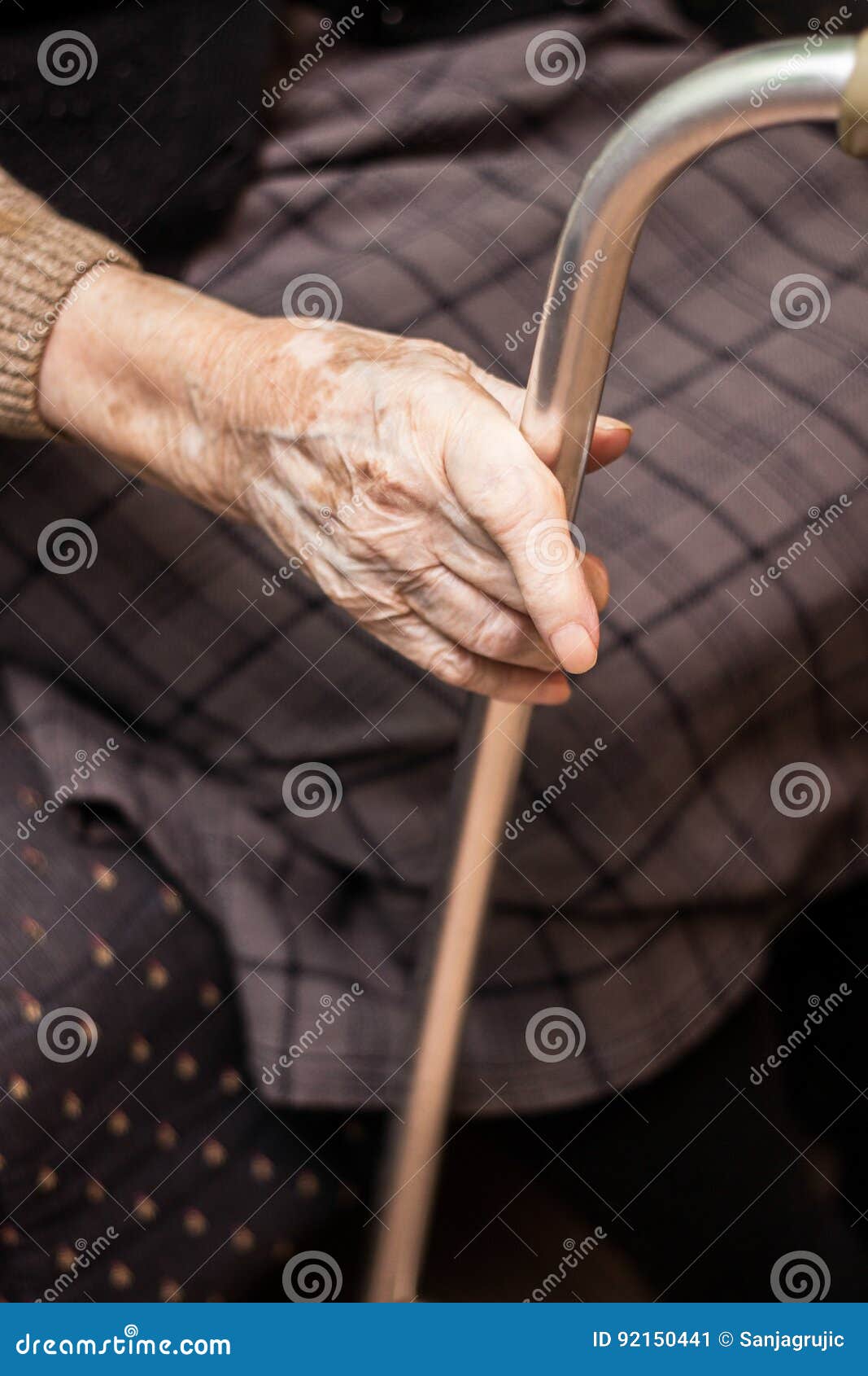Elderly hands on a walker stock image. Image of hand - 92150441