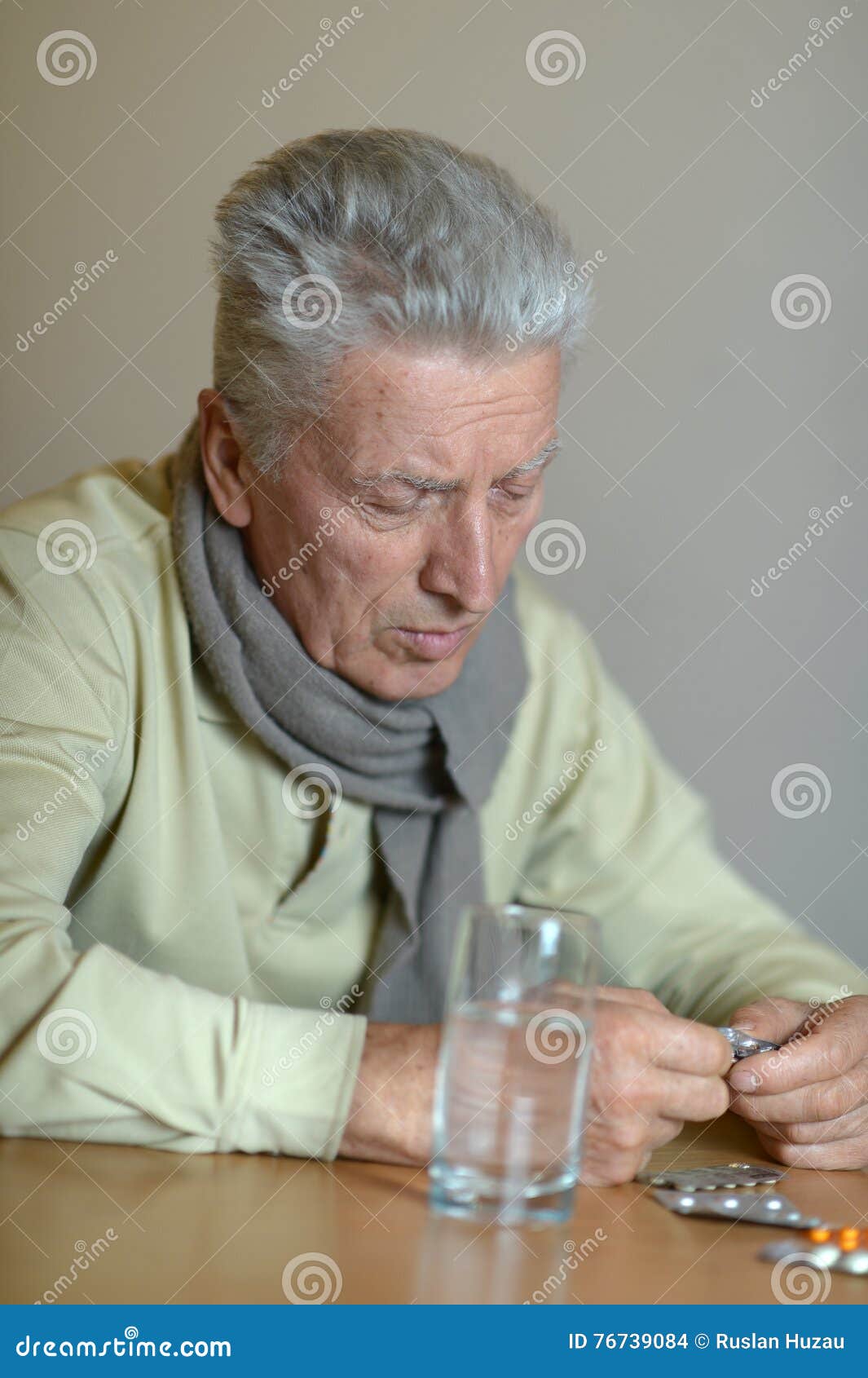 Elderly ill man with pills stock photo. Image of sick - 76739084