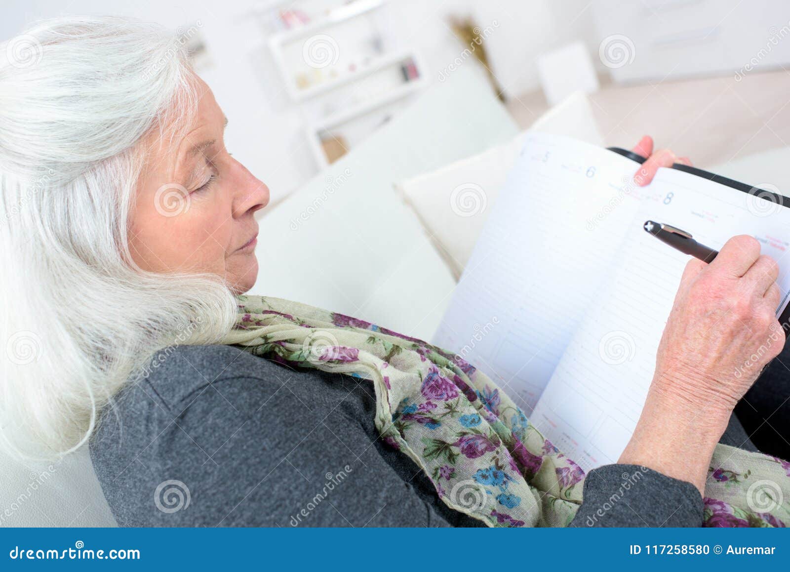 Elderly Lady Writing in Notebook Stock Photo - Image of writing, senior ...