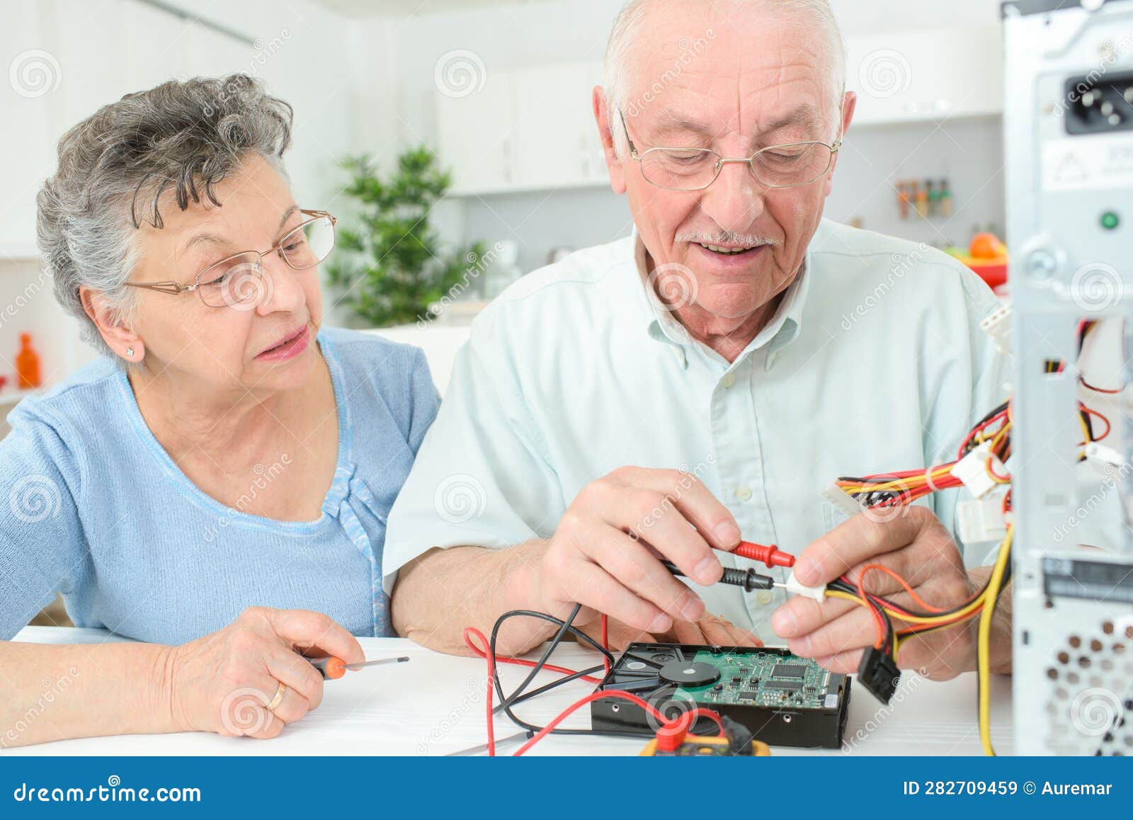 Elderly Man Checking Computer with Multimeter Stock Image - Image of ...