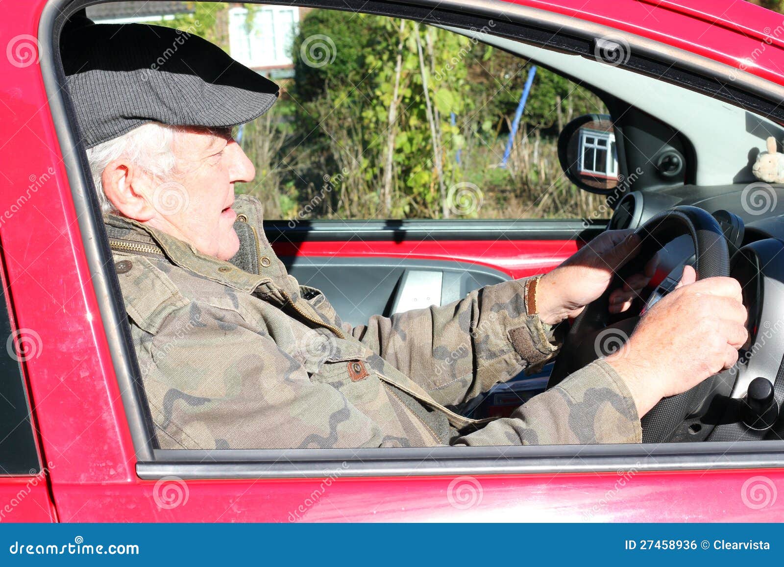 Elderly man driving a car. stock photo. Image of drive - 27458936