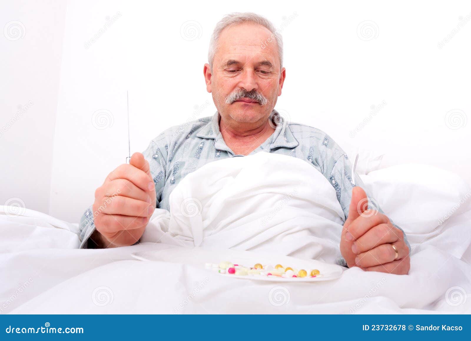 Elderly man eating meds stock photo. Image of elderly - 23732678