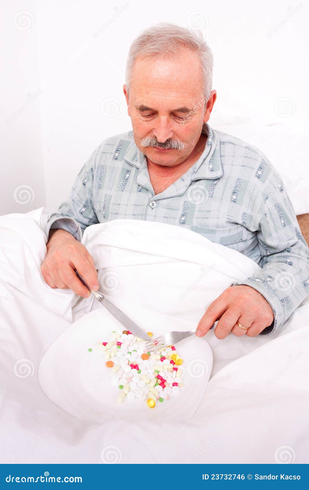 Elderly man eating meds stock photo. Image of health - 23732746