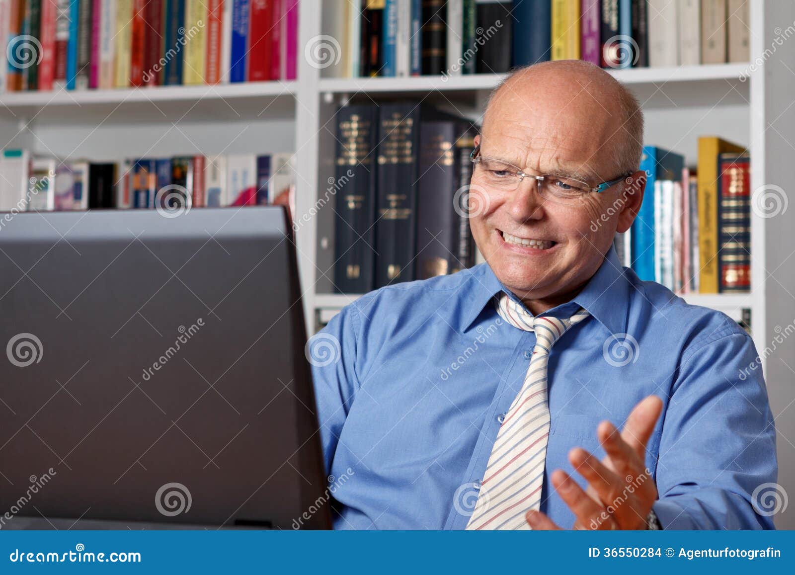 Elderly Man Frustrated in Front of Notebook Stock Photo - Image of ...