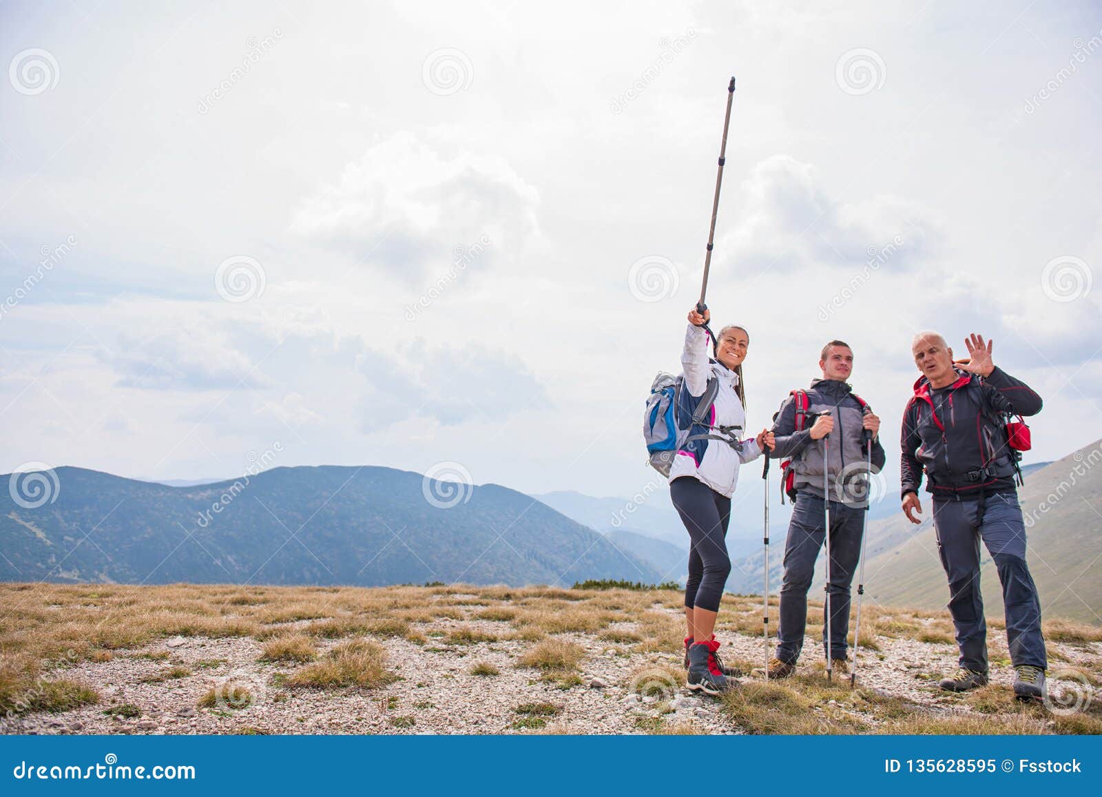 An Elderly Man Giving a Tour for a Young Group of People Stock Image ...