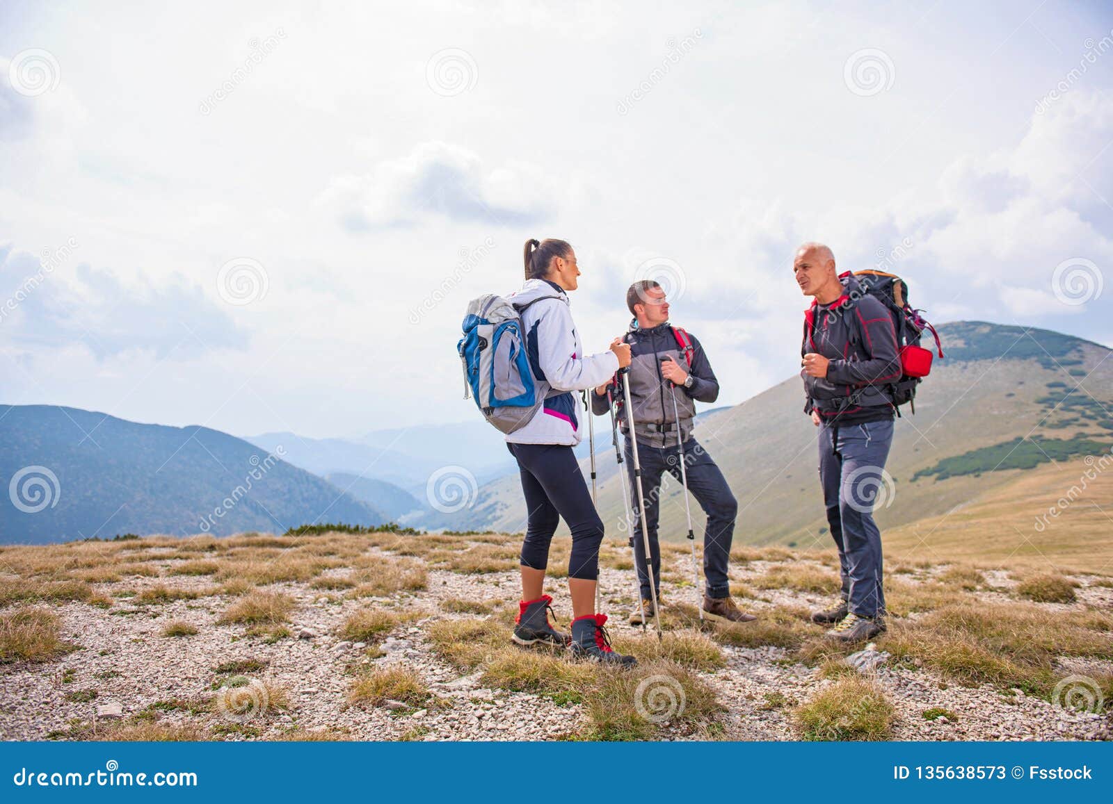 An Elderly Man Giving a Tour for a Young Group of People Stock Image ...