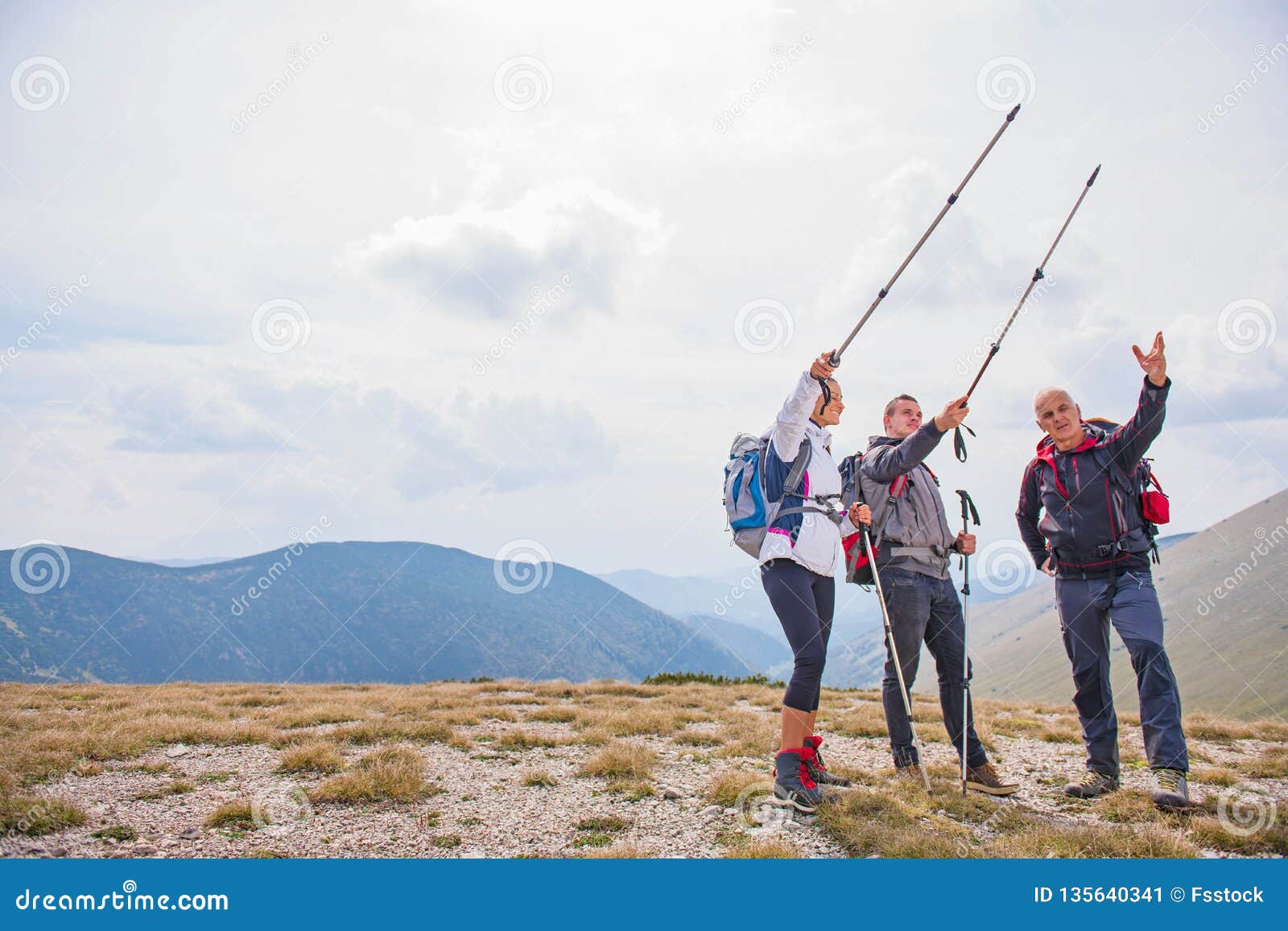 An Elderly Man Giving a Tour for a Young Group of People Stock Image ...
