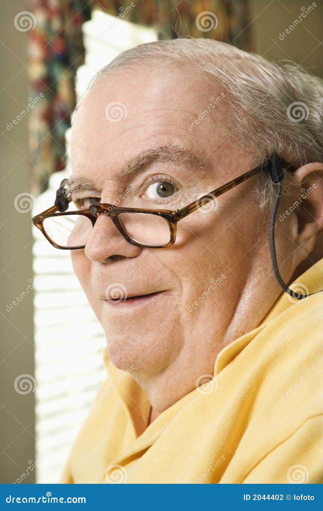 Elderly man with glasses. stock photo. Image of closed - 2044402