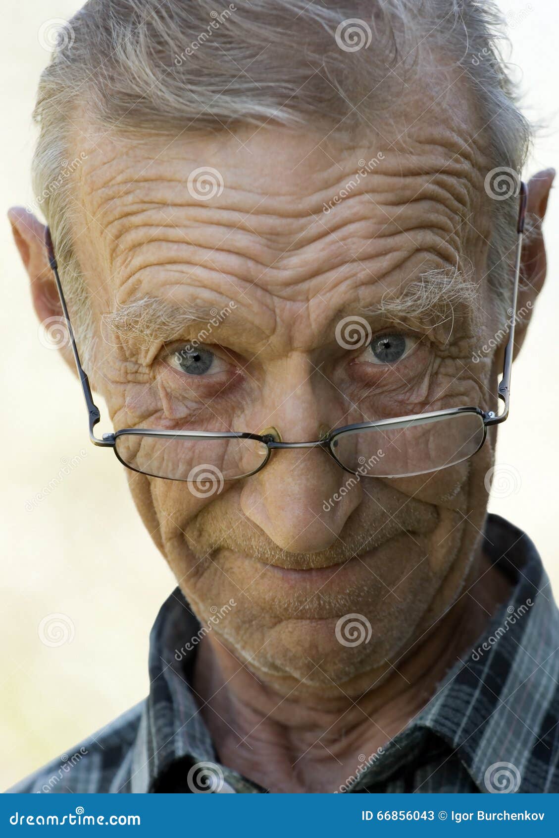 Elderly the man in glasses stock image. Image of person - 66856043