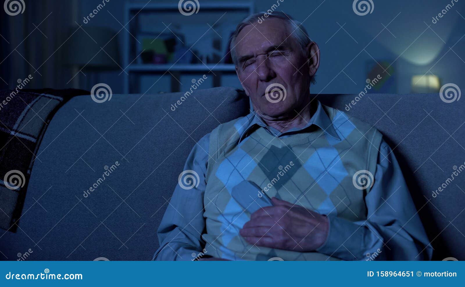 Elderly Man Holding Remote Controller Sleeping in Front of TV, Evening ...