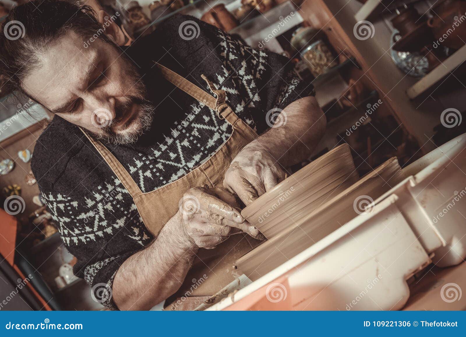 Elderly Man Making Pot Using Pottery Wheel in Studio Stock Photo ...